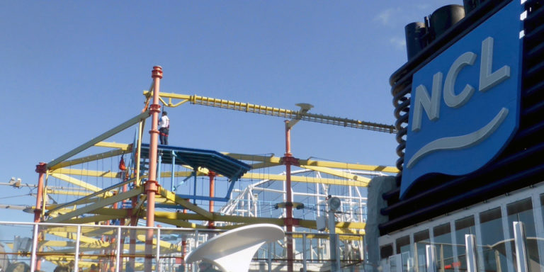NCL Breakaway Ropes Course with NCL sign | Notable Travels